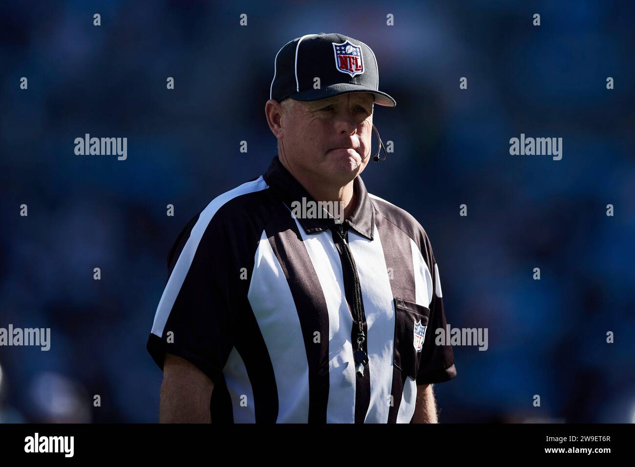 Line judge Rusty Baynes (59) at work during an NFL football game ...