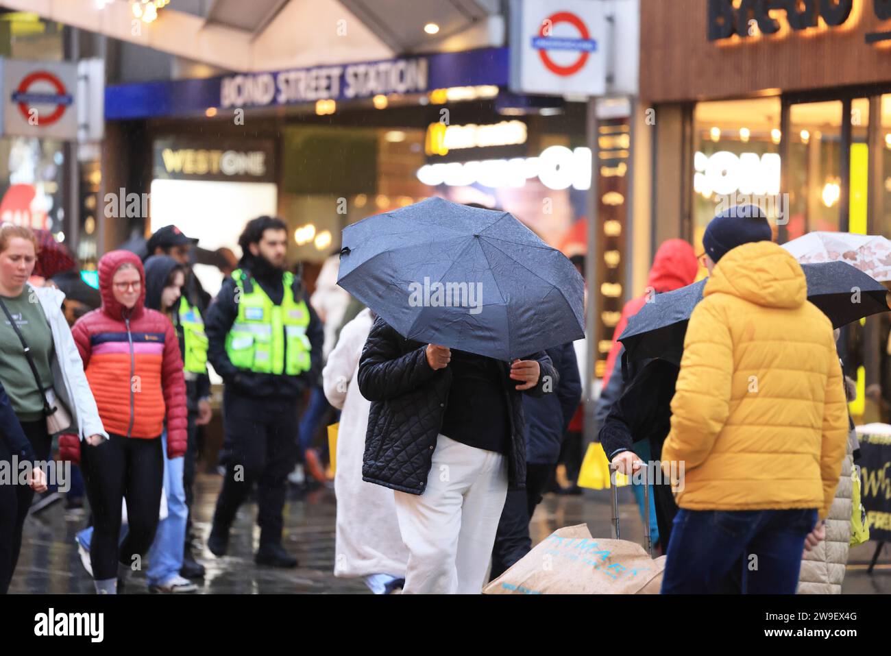 London, UK, 27th December 2023. Shoppers braved the gusty winds and ...