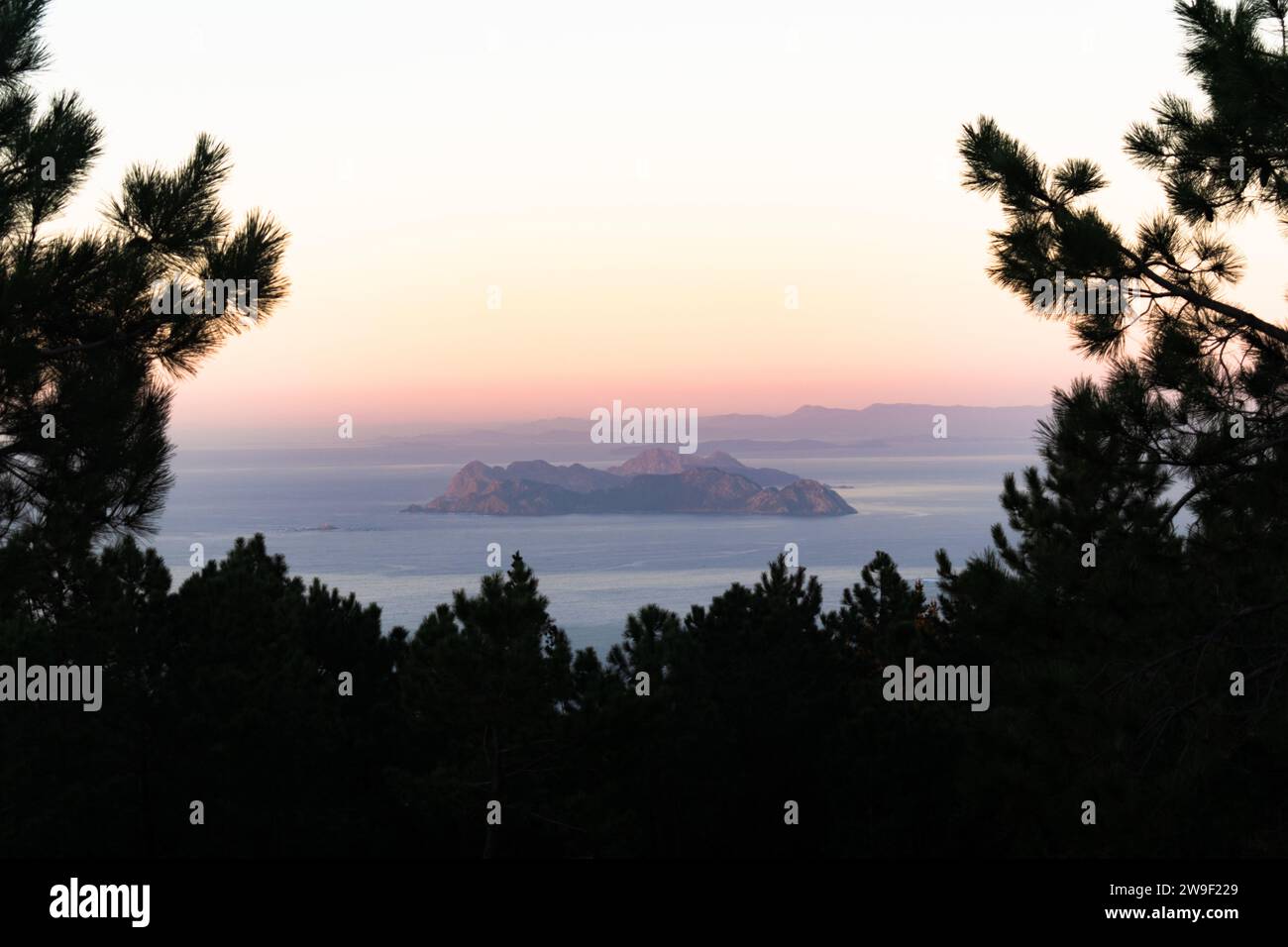 Sunset view of the Cies Islands in the distance and the Vigo estuary ...
