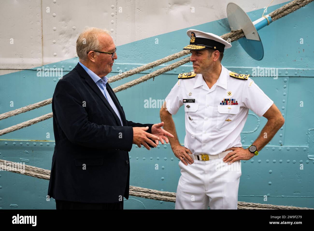 Canadian Defence Minister Bill Blair talks to Vice-admiral Angus ...