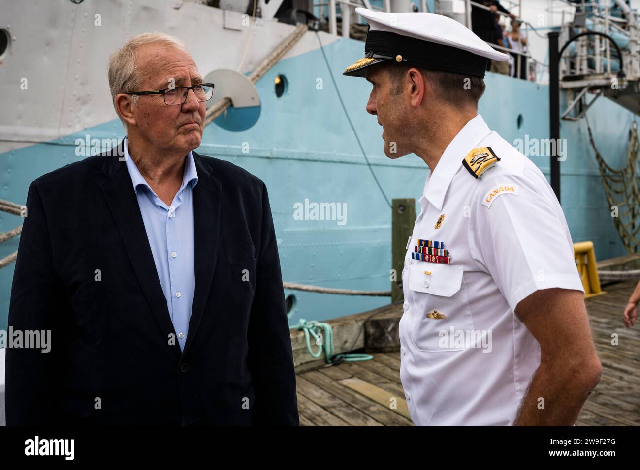 Canadian Defence Minister Bill Blair talks to Vice-admiral Angus ...