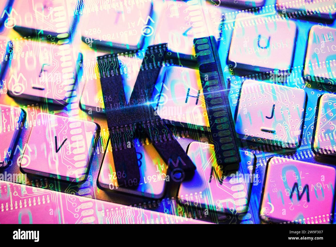 FOTOMONTAGE, Die Buchstaben K und I liegen auf einer Computertastatur ...