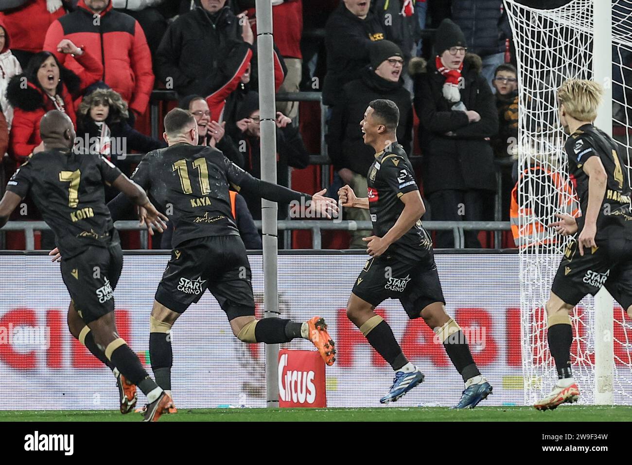 Liege, Belgium. 27th Dec, 2023. STVV's Joel Chima Fujita celebrates ...