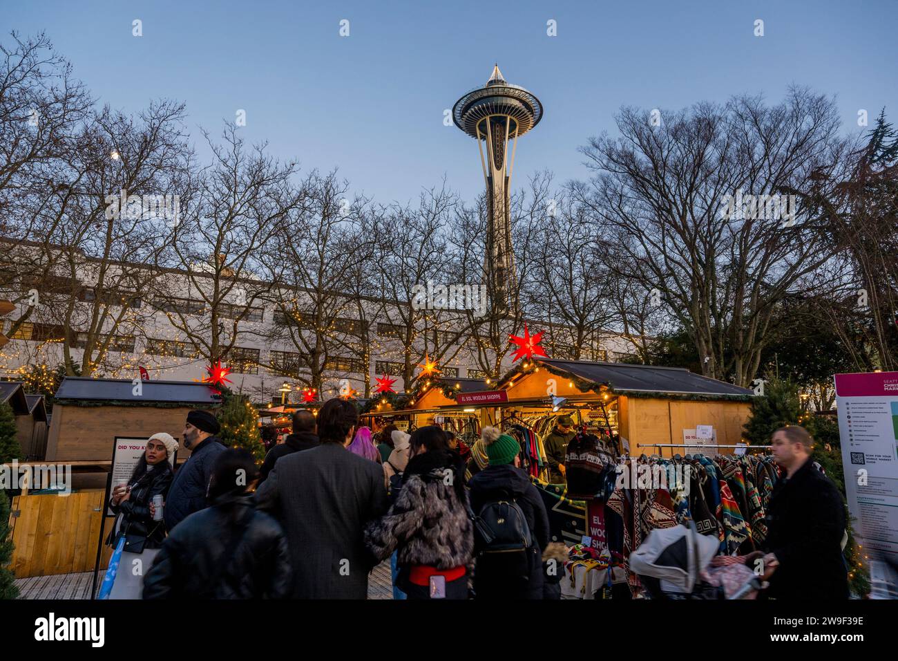 Seattle Christmas Market scene with vendor huts, holiday lights, people ...