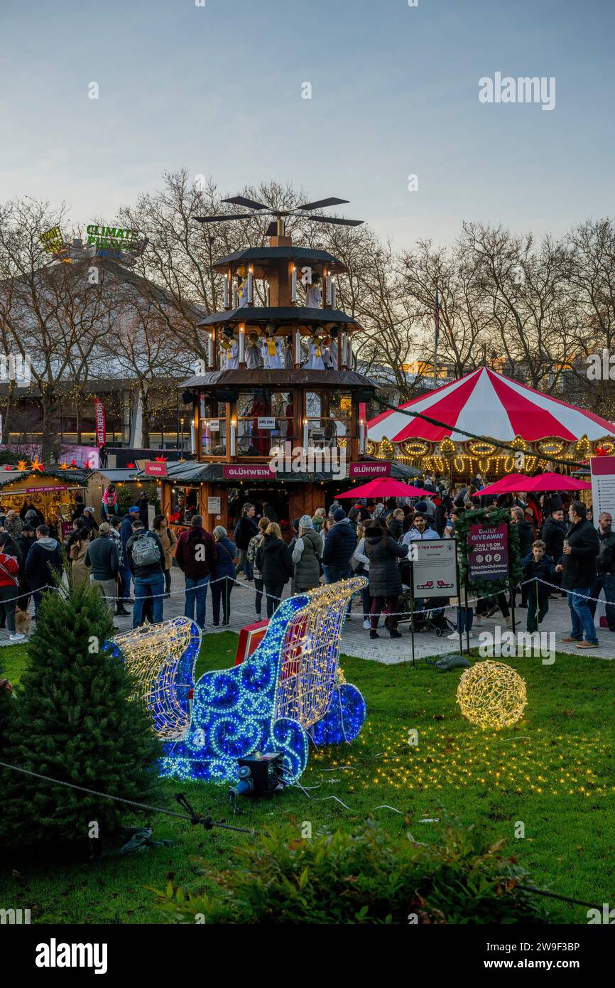 Seattle Christmas Market scene with the Christmas Pyramid, Santa s ...