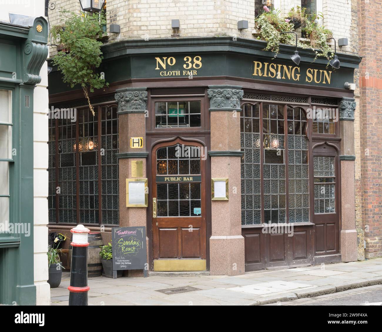 London, UK - March 16 2023; Outside and entrance of Rising Sun pub at ...