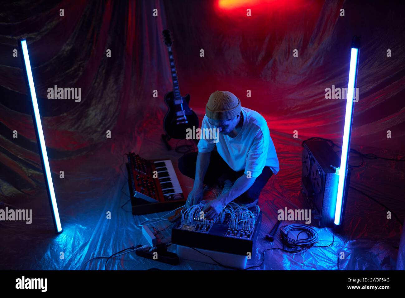 Male Musician in Makeshift Recording Studio Stock Photo - Alamy