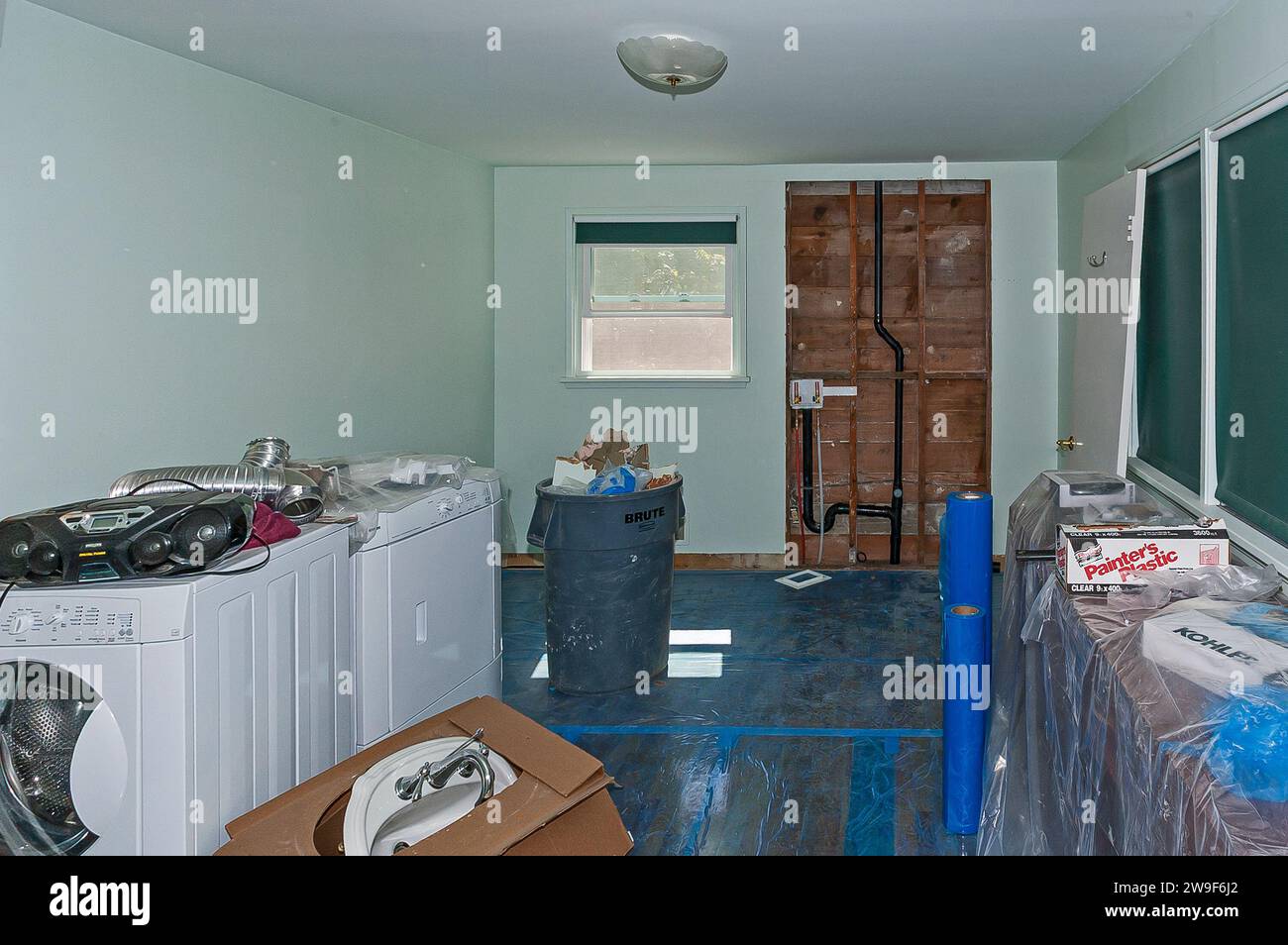 In-progress image of a laundry room remodel Stock Photo - Alamy