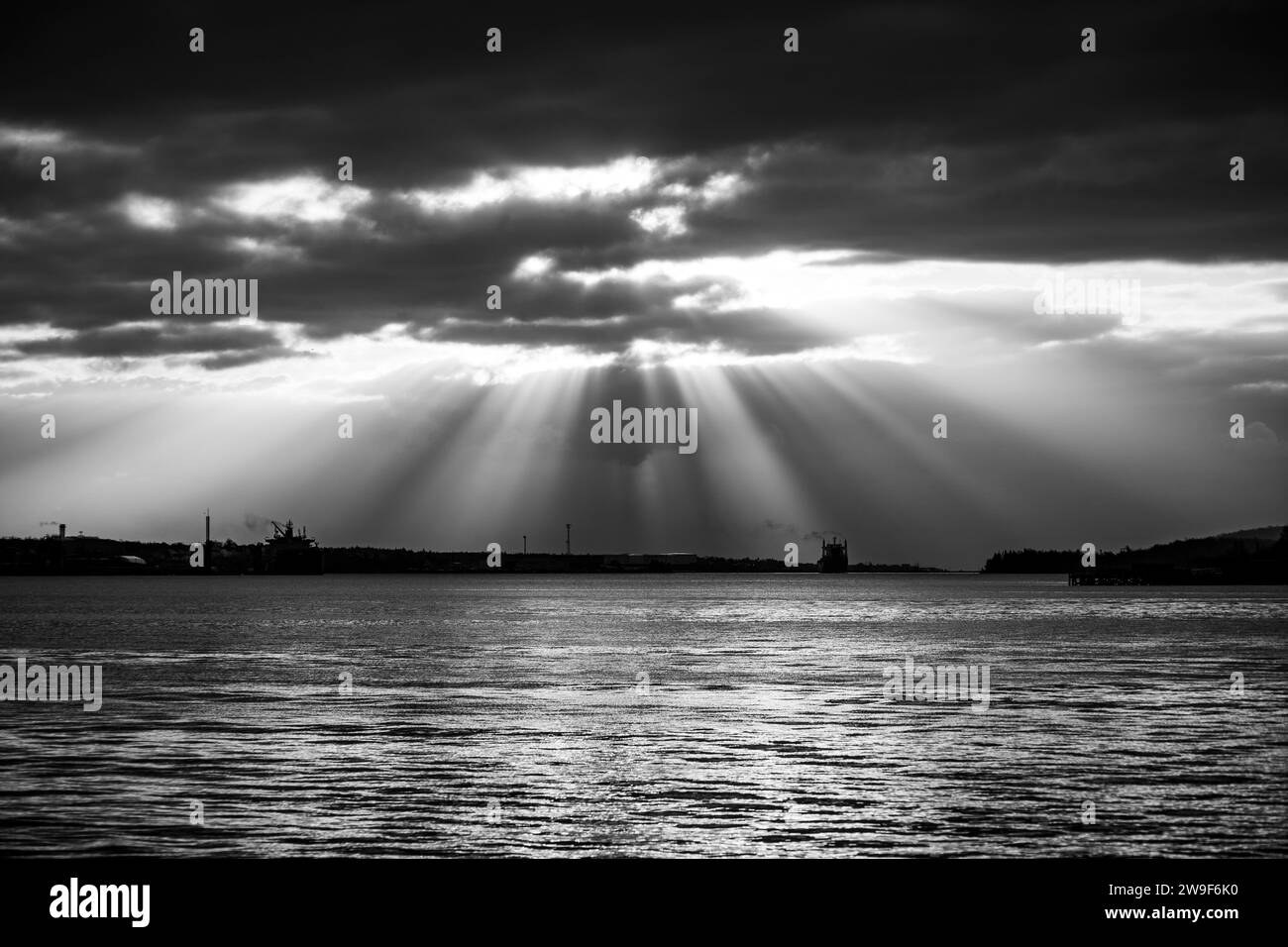 Clouds with light fingers Black and White Stock Photos & Images - Alamy