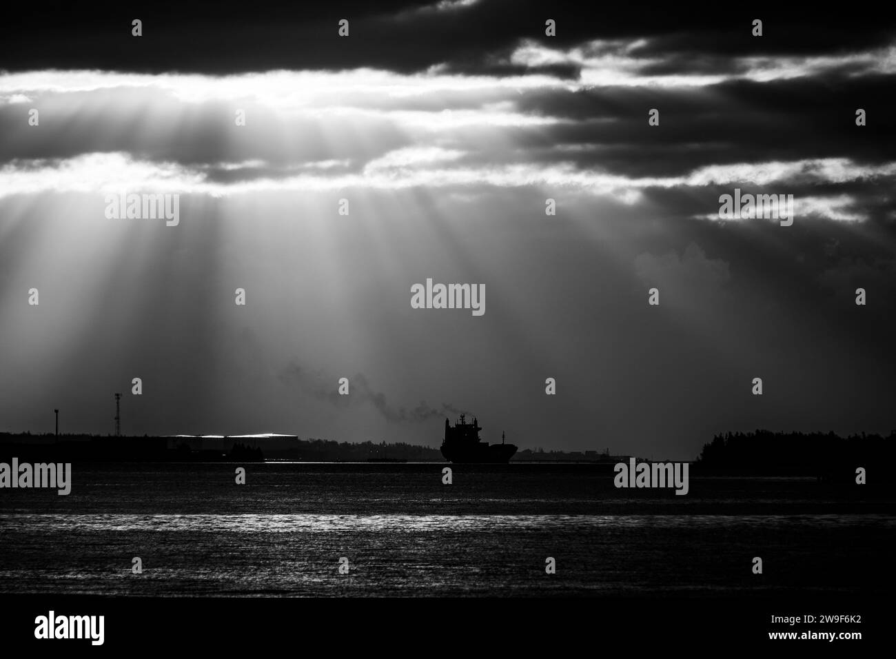 Clouds with light fingers Black and White Stock Photos & Images - Alamy