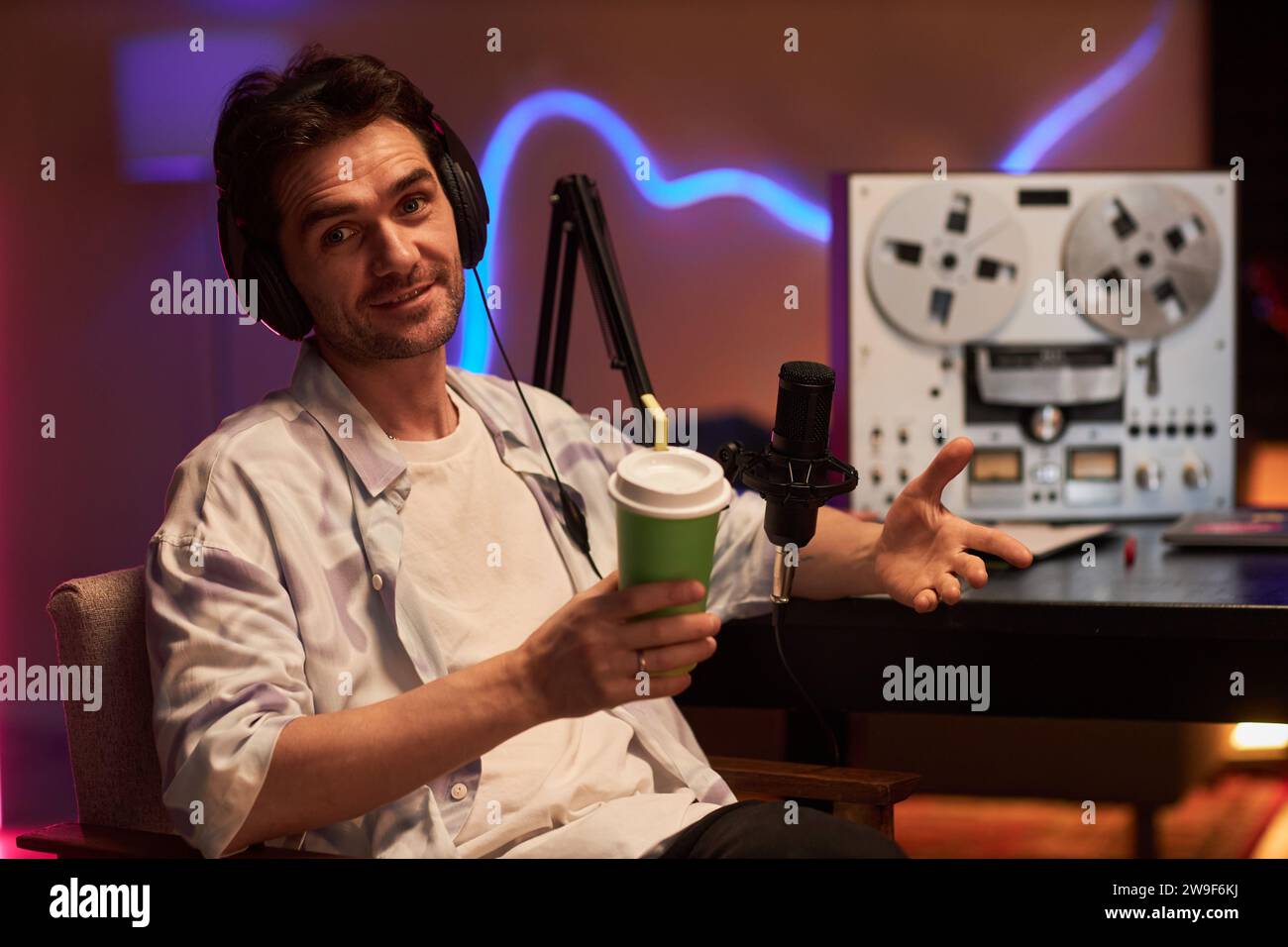 Handsome male podcaster talking hi-res stock photography and images - Alamy