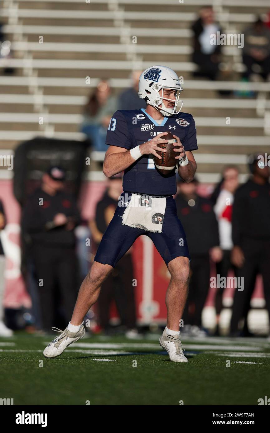 Old Dominion Monarchs quarterback Grant Wilson (13) drops back to pass during the Famous ...