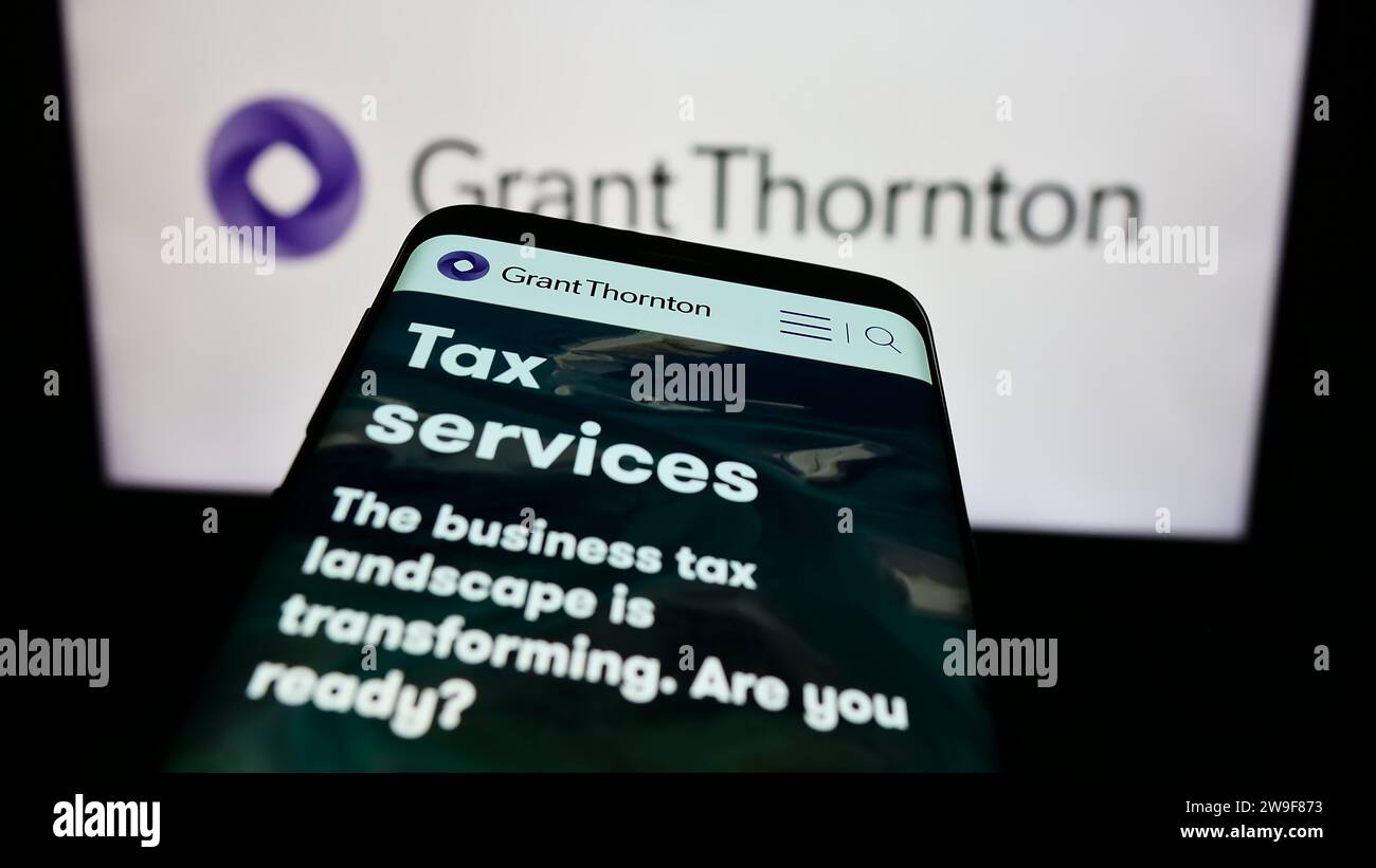Mobile phone with website of consulting company Grant Thornton ...