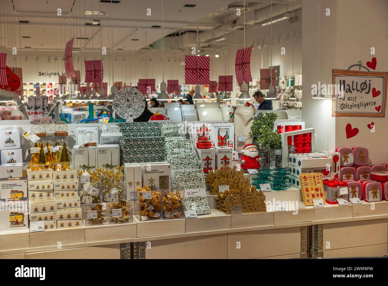 Close-up view of a shelf with festive Christmas sweets in gift ...