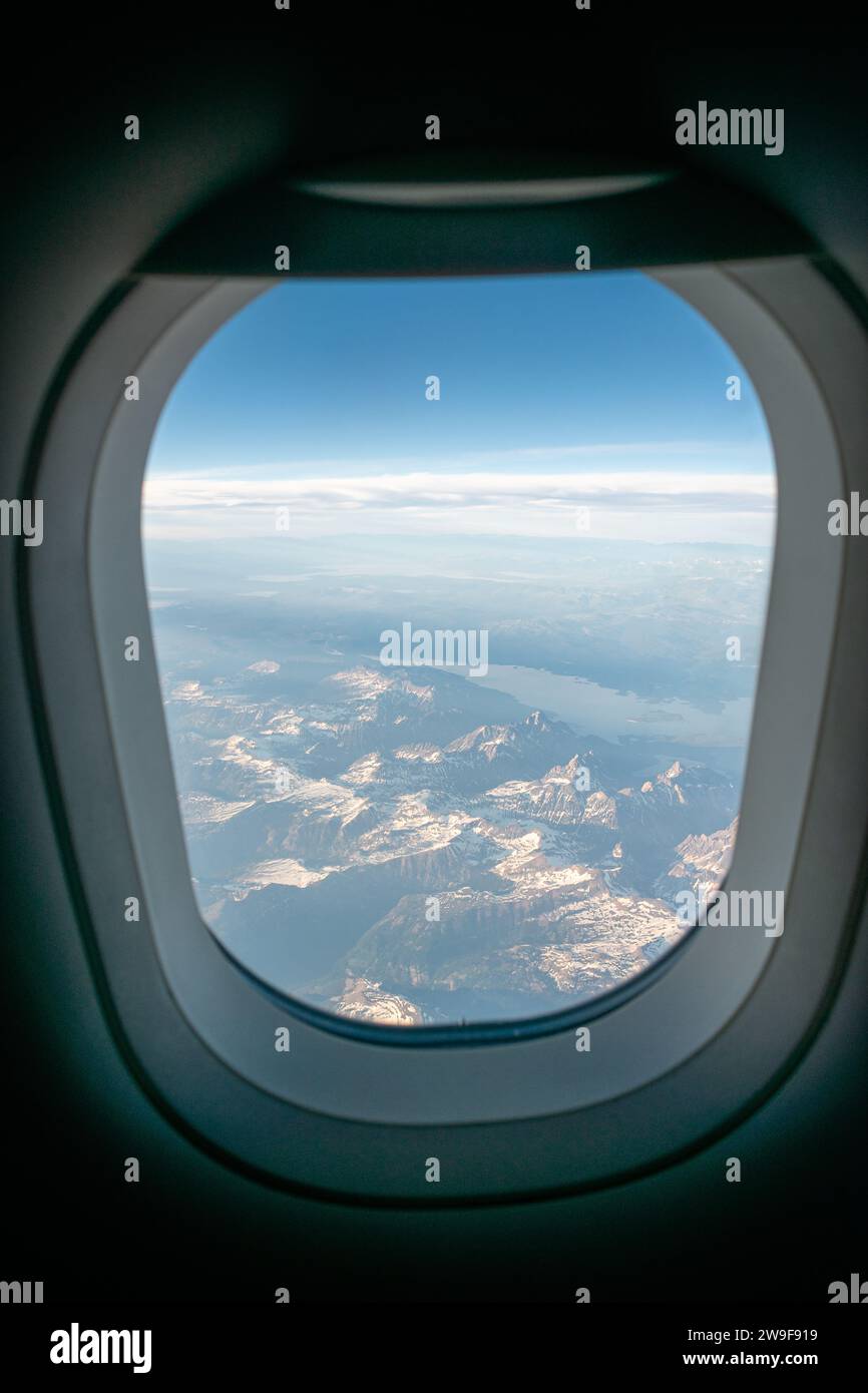 Captivating aerial view of the Teton Range from the window of a high ...