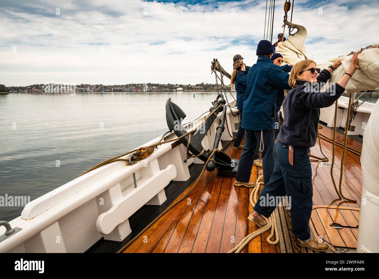Stowing sails onboard the replica Grand Banks fishing schooner Bluenose ...
