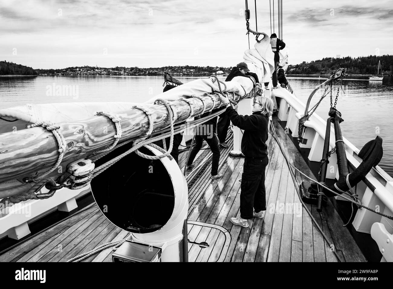 Stowing sails onboard the replica Grand Banks fishing schooner Bluenose ...
