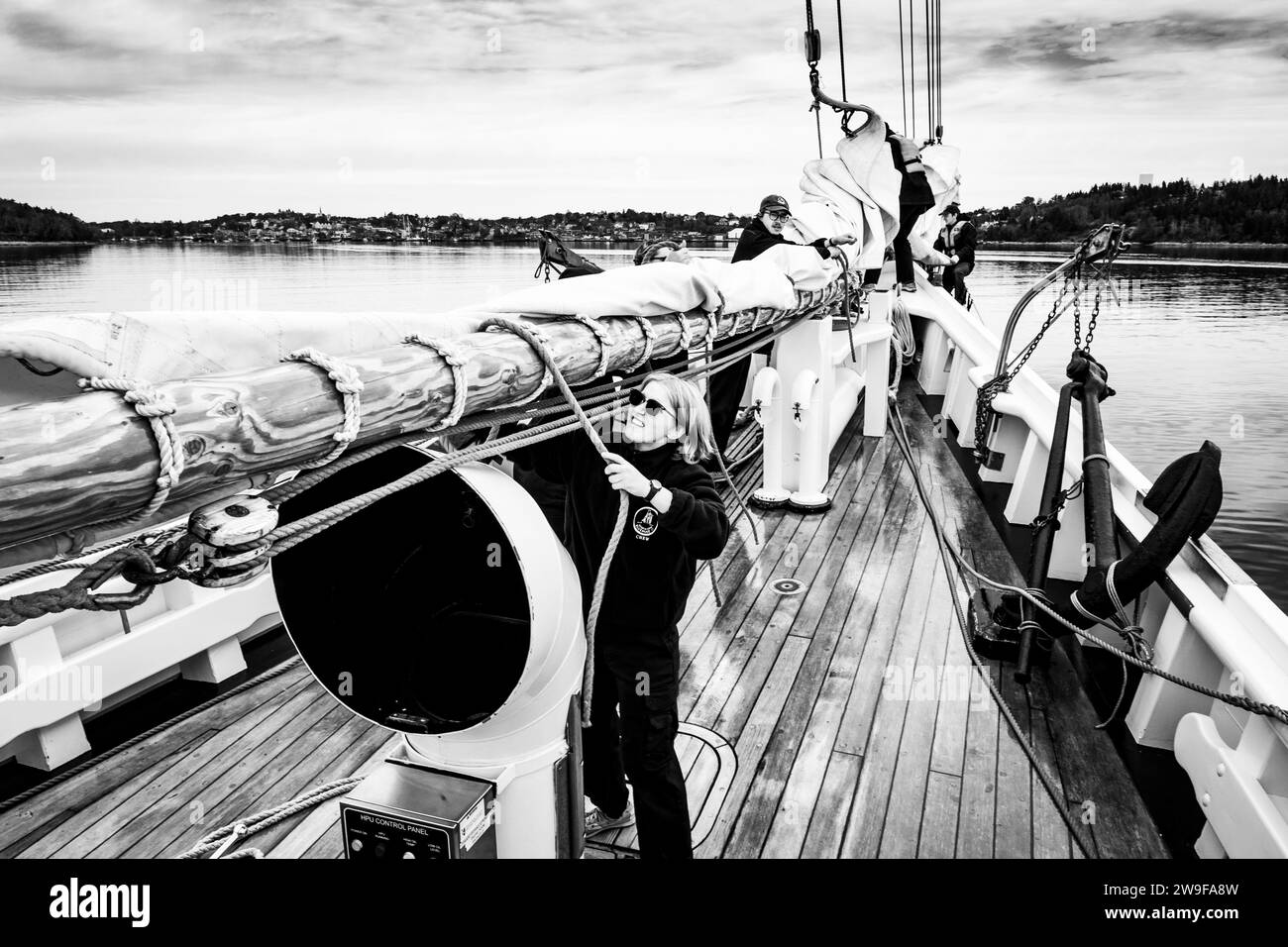 Stowing sails onboard the replica Grand Banks fishing schooner Bluenose ...