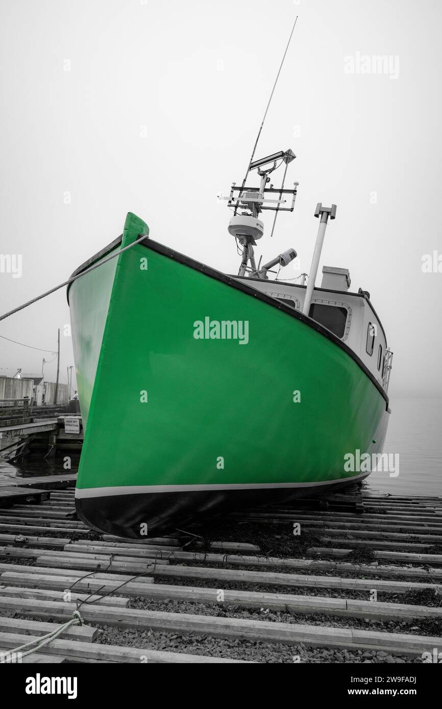 Fishing boat hauled out on skids at Fisherman's Cove in Dartmouth, Nova ...