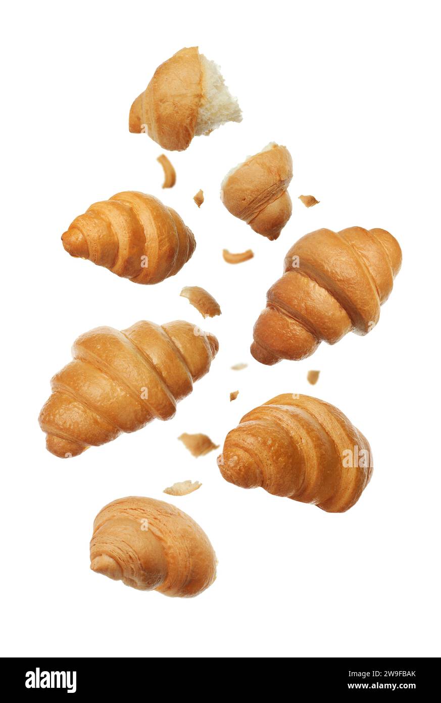 Delicious fresh croissants falling on white background Stock Photo - Alamy