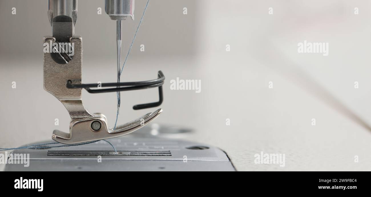 Dressmaking workshop. Sewing machine, closeup. Banner design with space ...