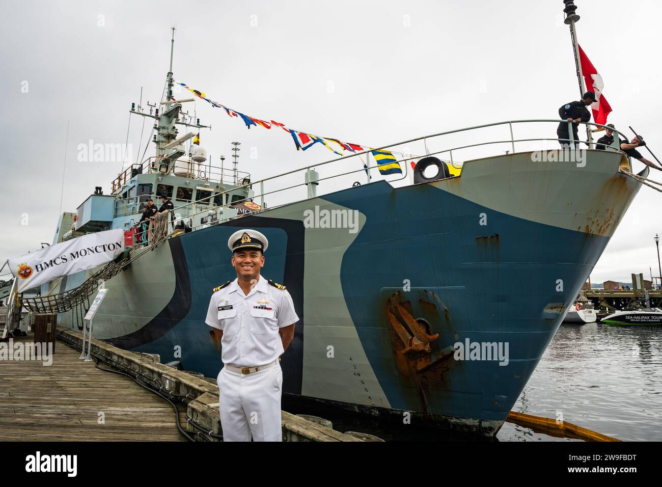 Lieutenant-commander (LCDR) Carlo Amunategui, CO of HMCS Moncton, poses ...