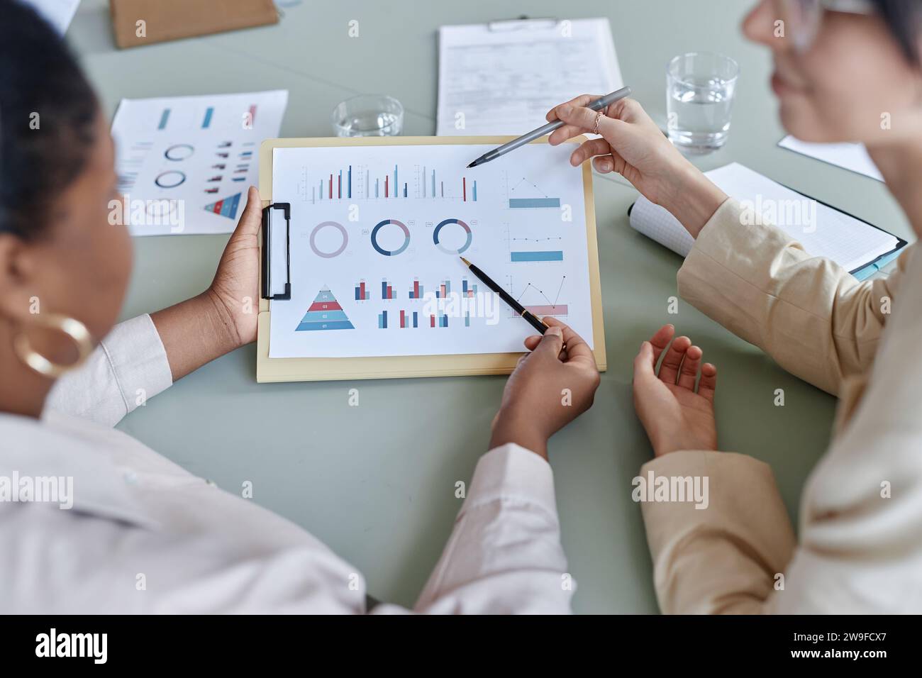 Company Employees Choosing Graphs Design for Business Report Stock ...