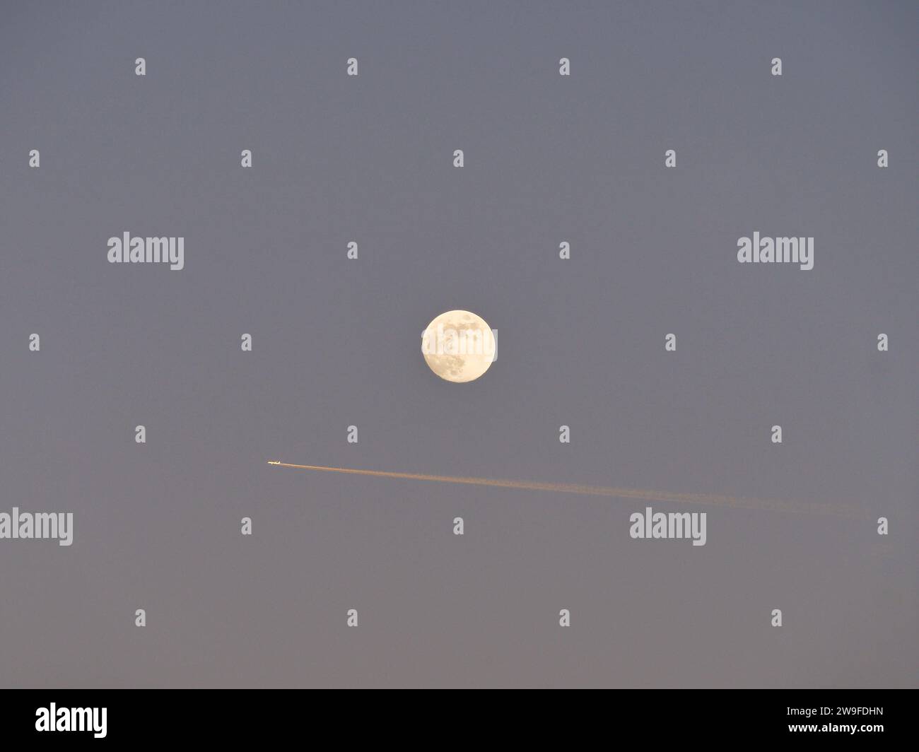 Full moon with airplane crossing. High quality photo Stock Photo - Alamy