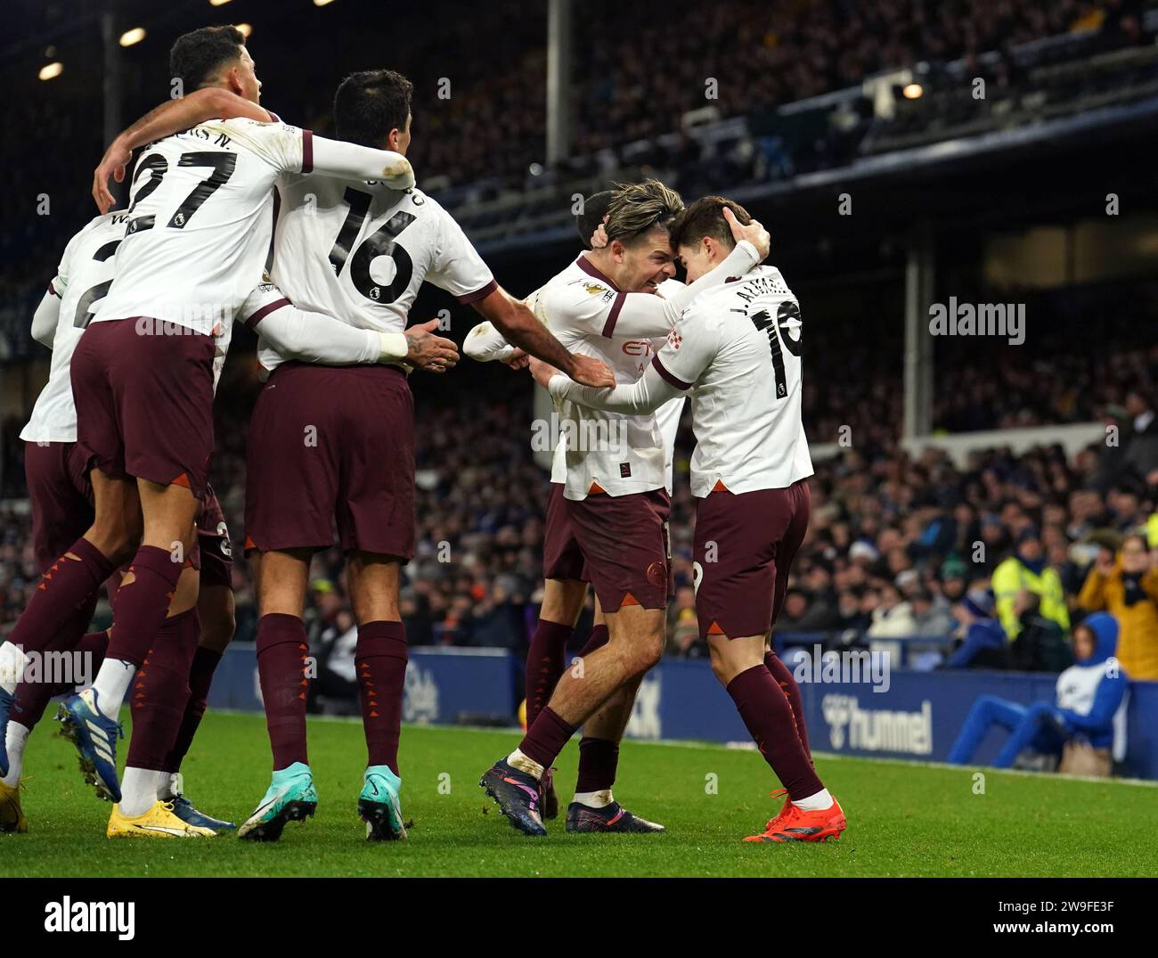 Manchester City's Julian Alvarez (right) celebrates with Jack Grealish ...