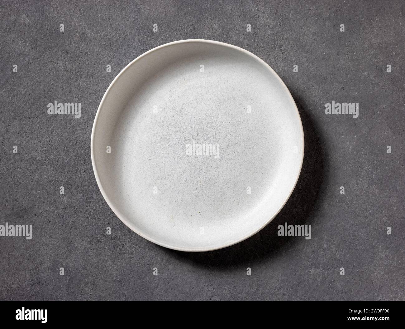 Grey ceramic plate painted hi-res stock photography and images - Alamy