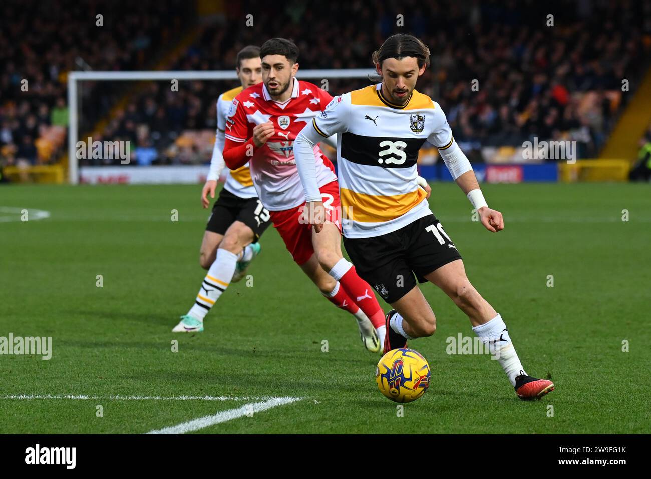 Burslem, UK, 26th December 2023. Port Vale's number 10, Ethan Chislett ...