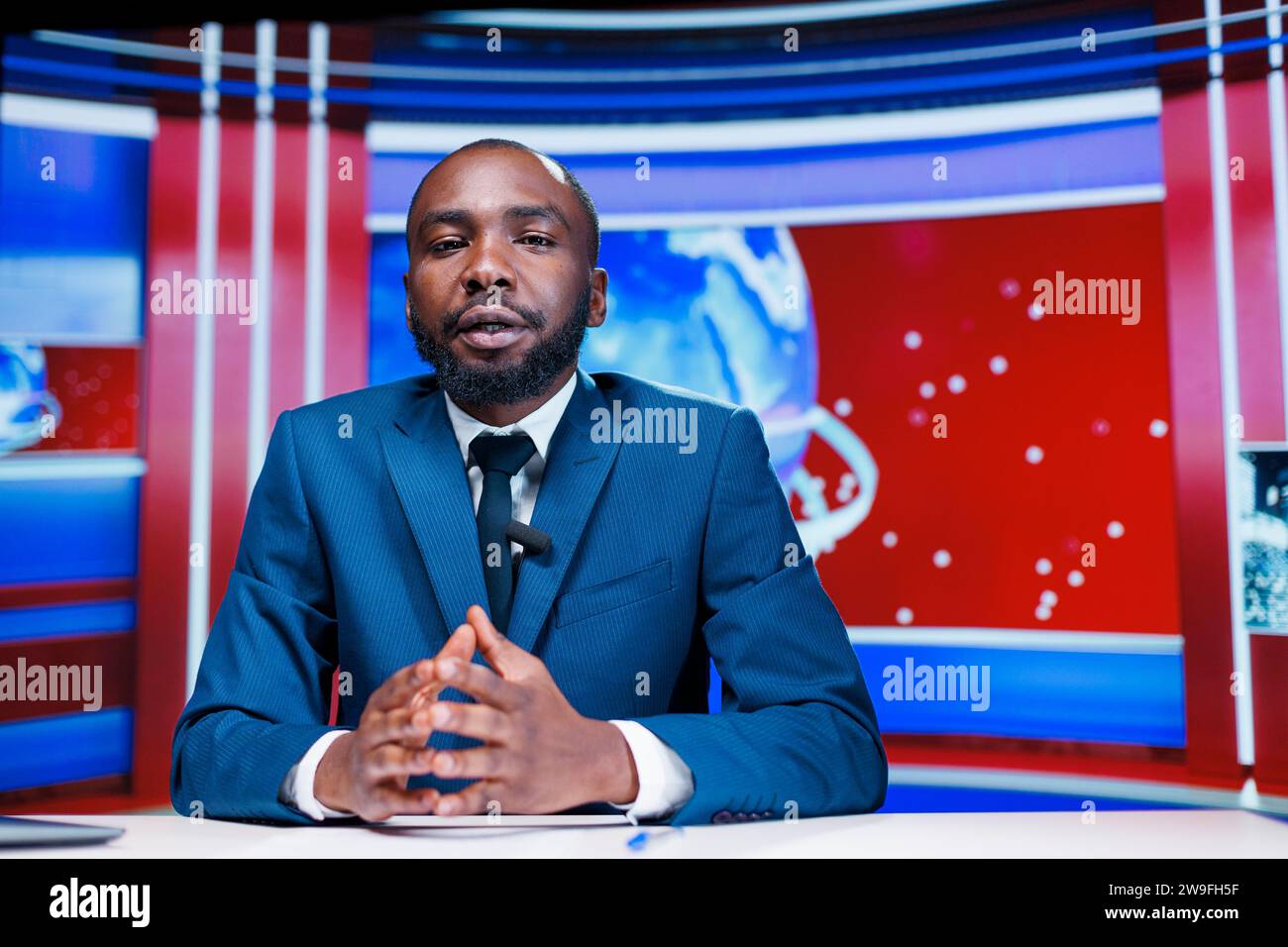 Anchorman presenting latest events on global television channel ...