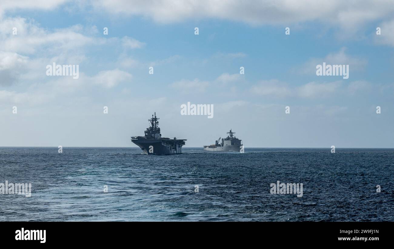 The Wasp-class amphibious assault ship USS Boxer (LHD 4) and amphibious ...
