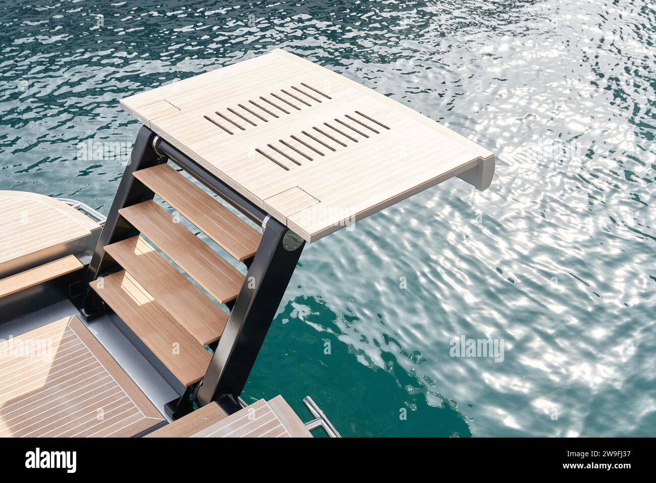Stern of luxury motor boat with stairs on famous yacht show, exhibition ...