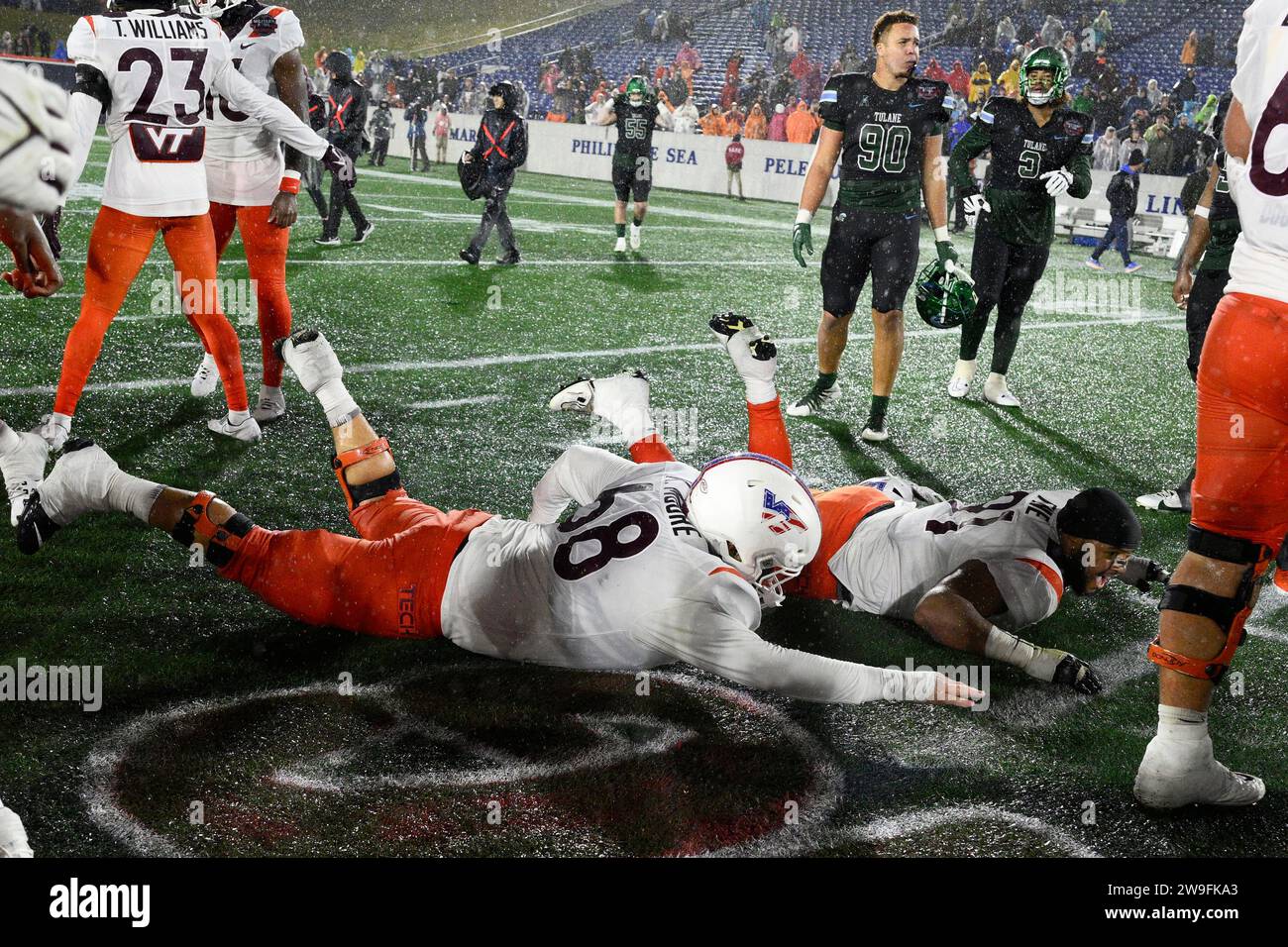 Virginia Tech offensive lineman Kaden Moore (68) and Virginia Tech ...