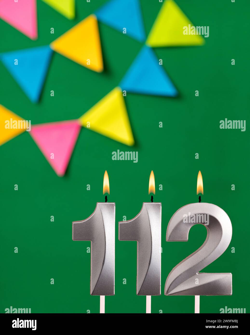 Vertical birthday card with number 112 candle - Green background with ...