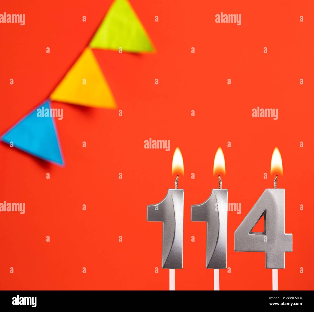Birthday card - Number 114 candle in orange background Stock Photo - Alamy