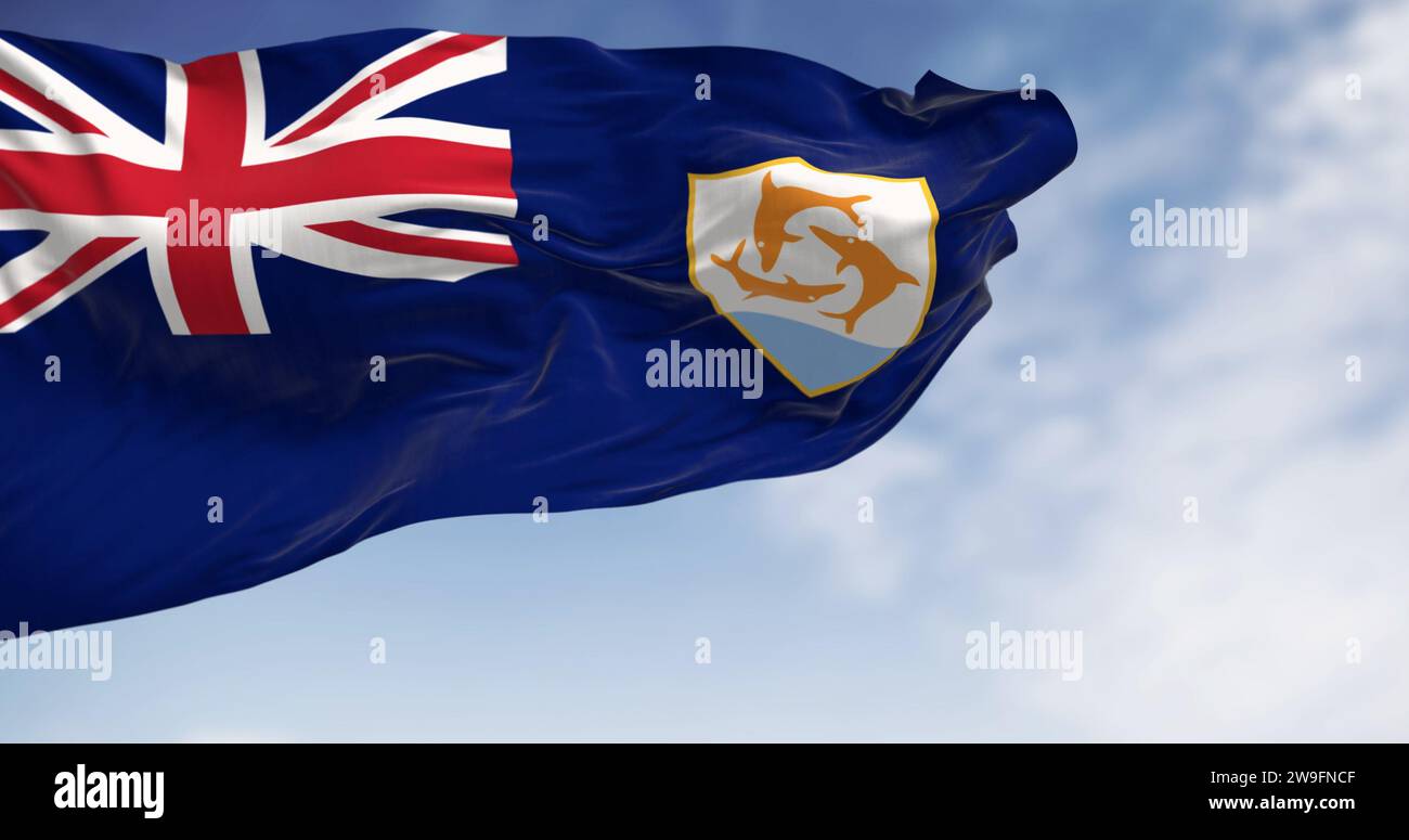 Anguilla Flag waving in the wind on a clear day. Blue Ensign with ...