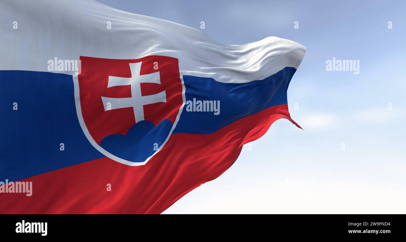 Close-up of Slovakia national flag waving in the wind on a clear day ...