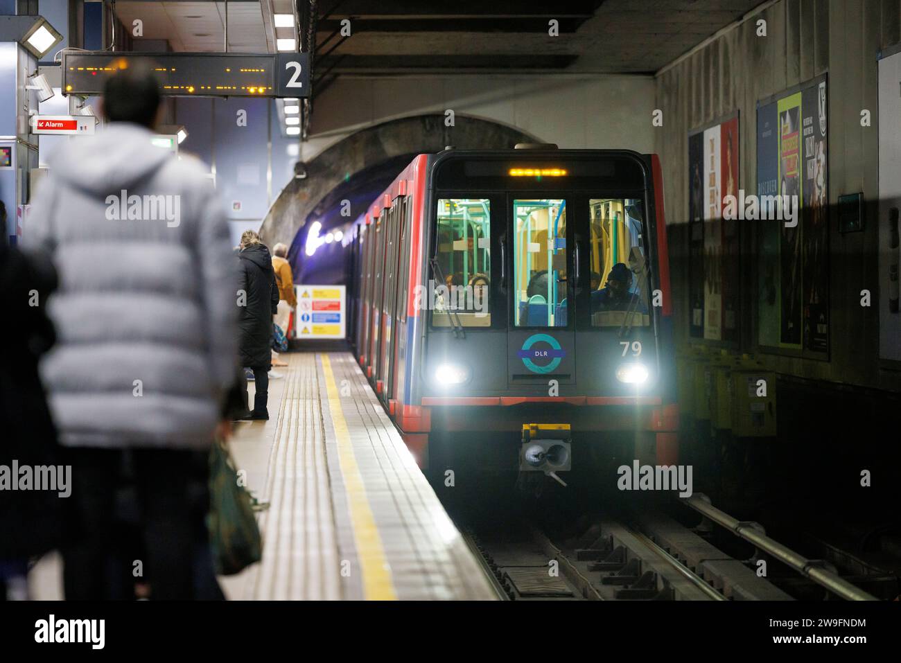 A Docklands Light Railway DLR train enters the northbound platform at ...