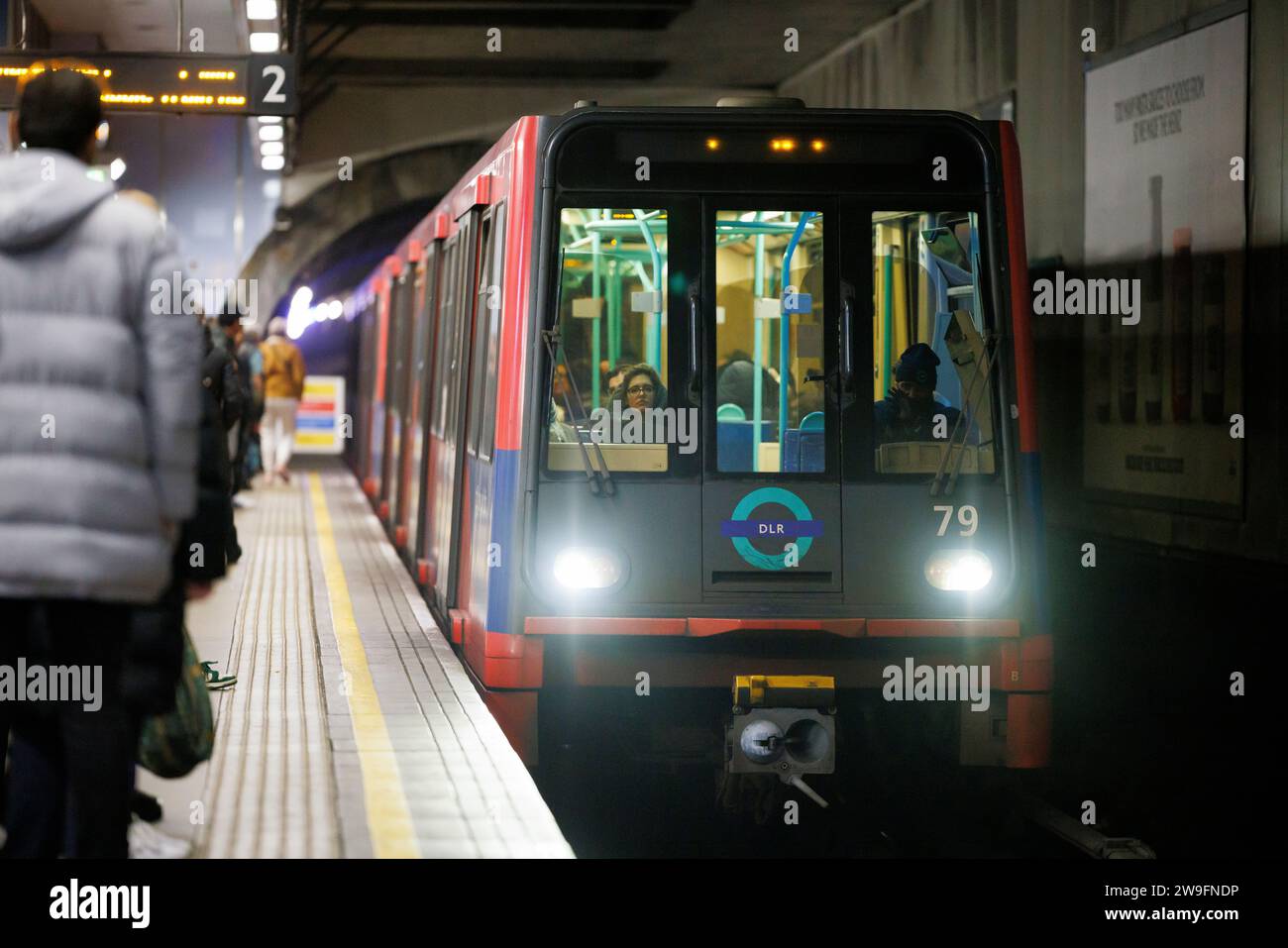 A Docklands Light Railway DLR train enters the northbound platform at ...
