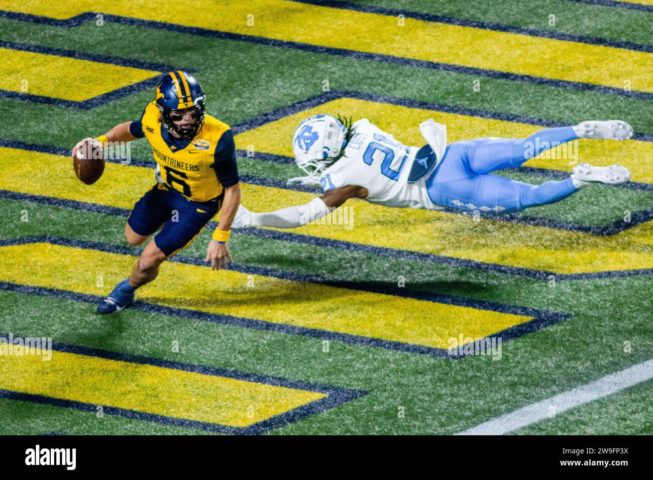 Charlotte, NC, USA. 27th Dec, 2023. West Virginia Mountaineers ...