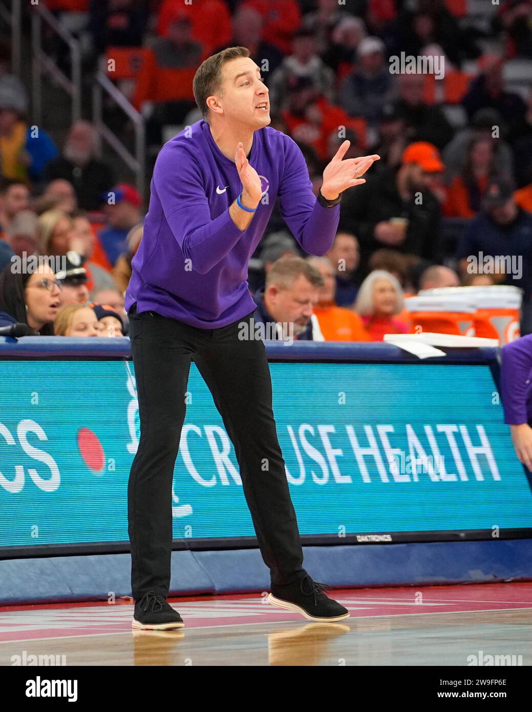 SYRACUSE, NY - DECEMBER 21: Niagara Purple Eagles Head Coach Greg ...