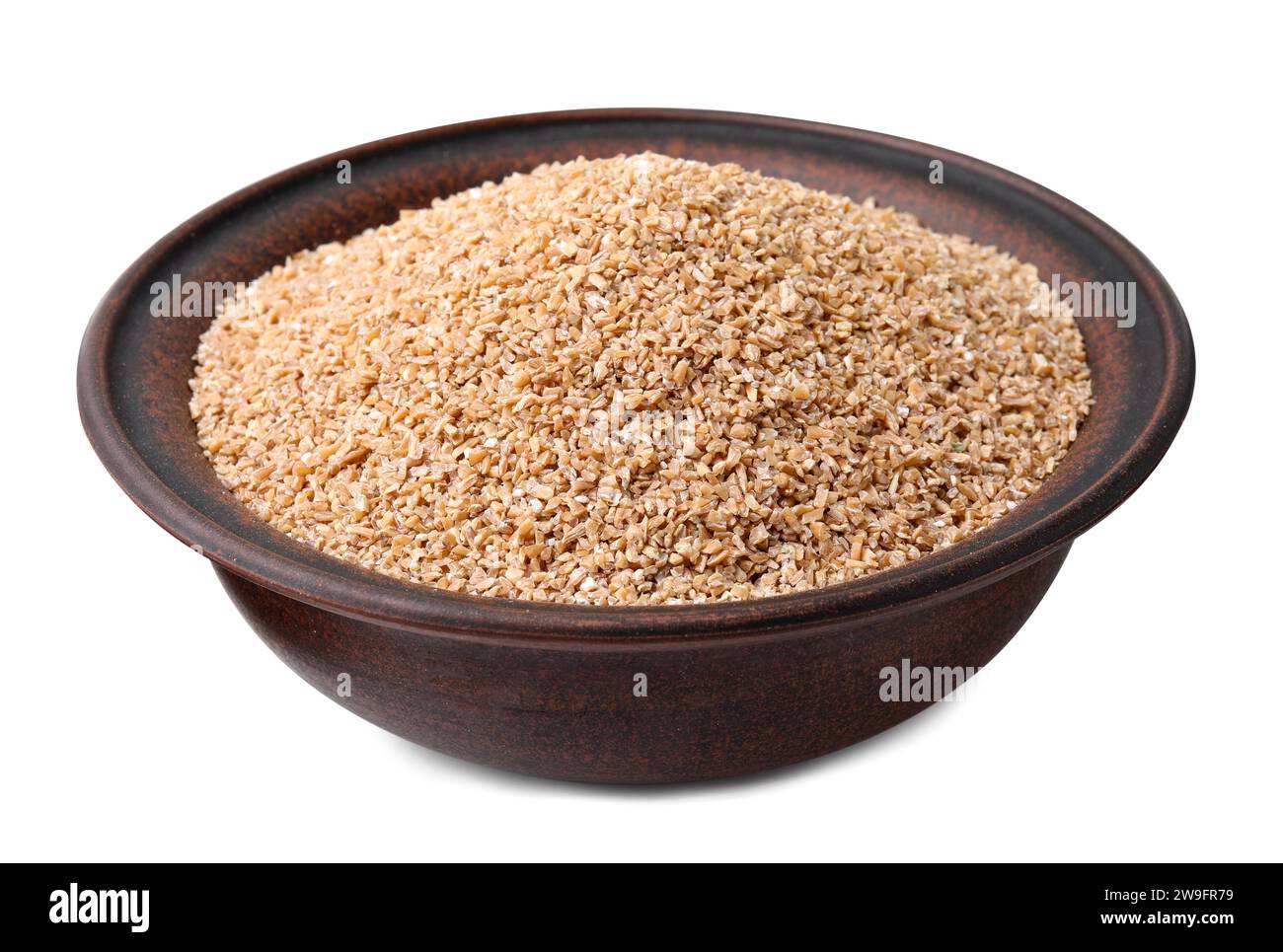 Dry wheat groats in bowl isolated on white Stock Photo - Alamy