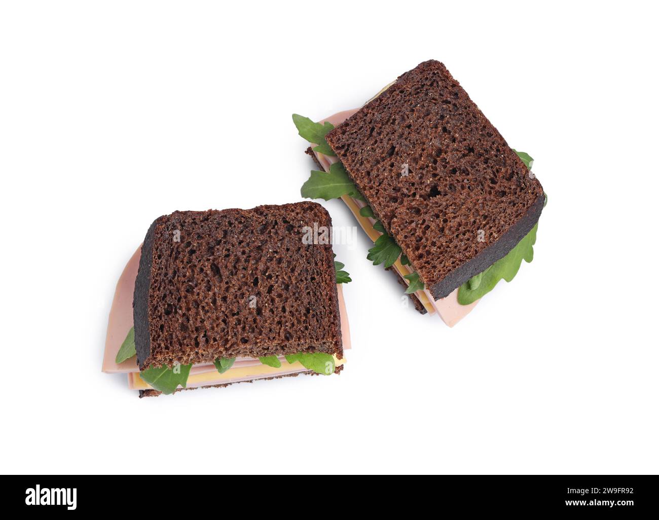 Delicious sandwiches with boiled sausage, cheese and arugula isolated ...