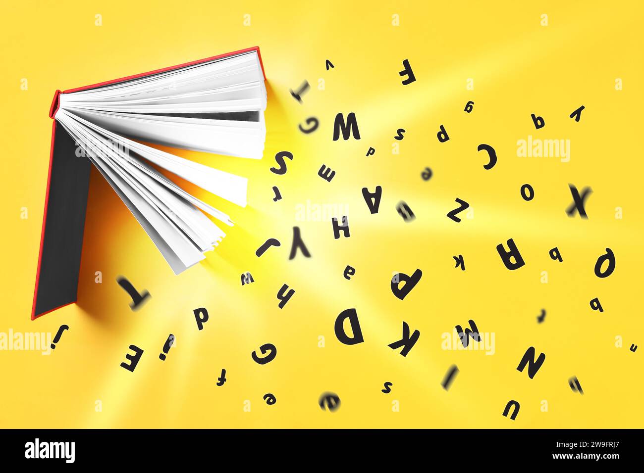 Letters flying out from open book on yellow background, top view Stock ...