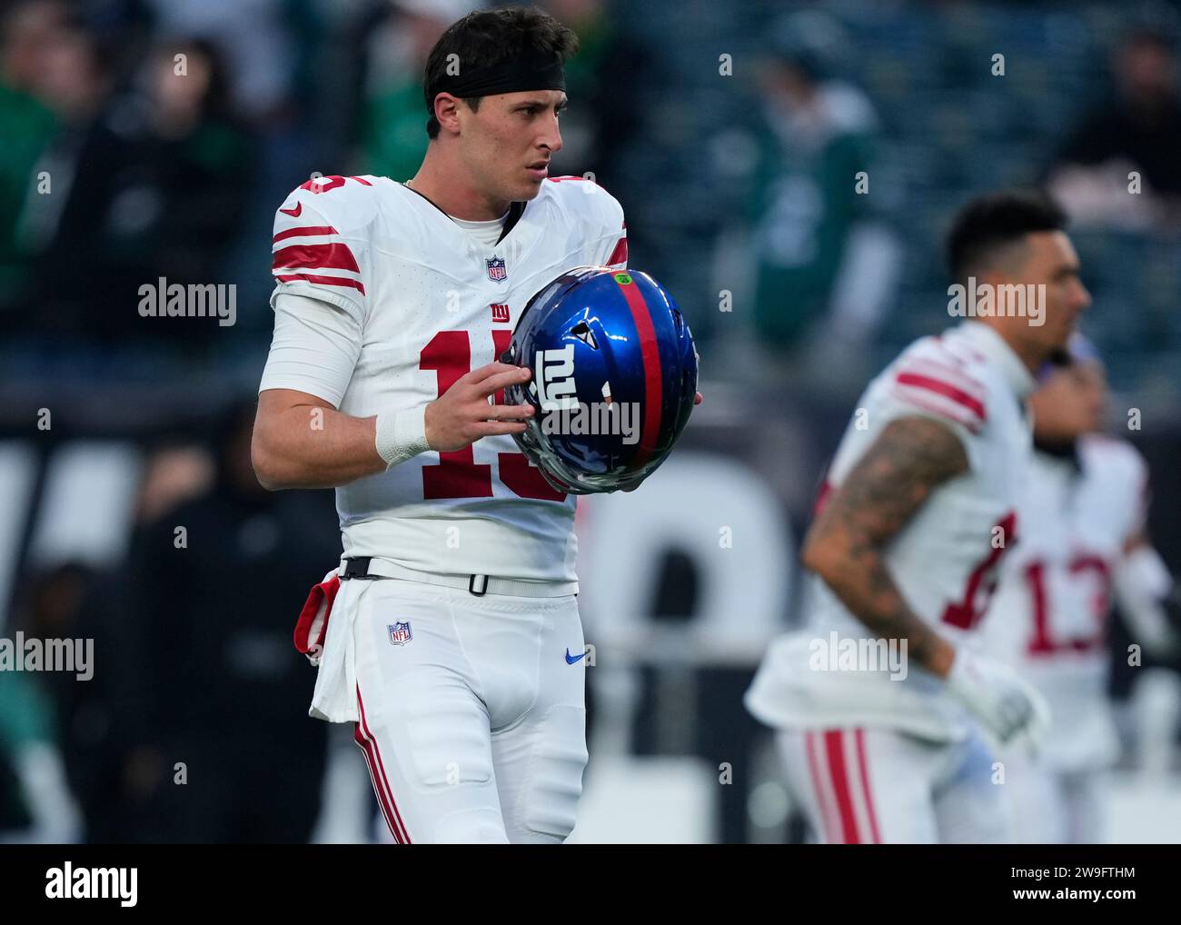 New York Giants quarterback Tommy DeVito in action before an NFL ...