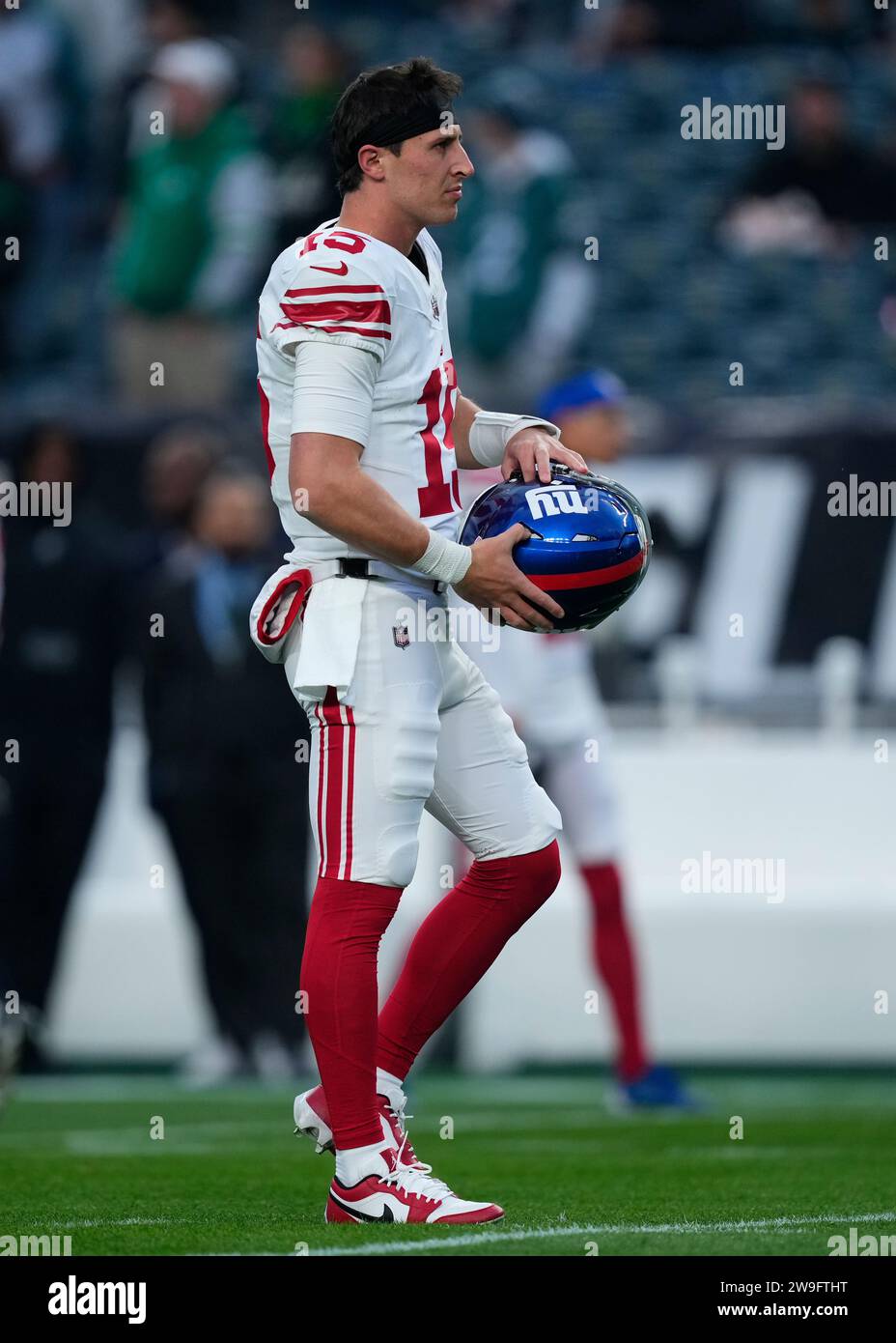 New York Giants quarterback Tommy DeVito in action before an NFL ...