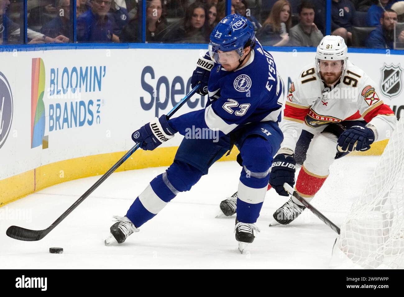 Tampa Bay Lightning center Michael Eyssimont (23) carries the puck ...
