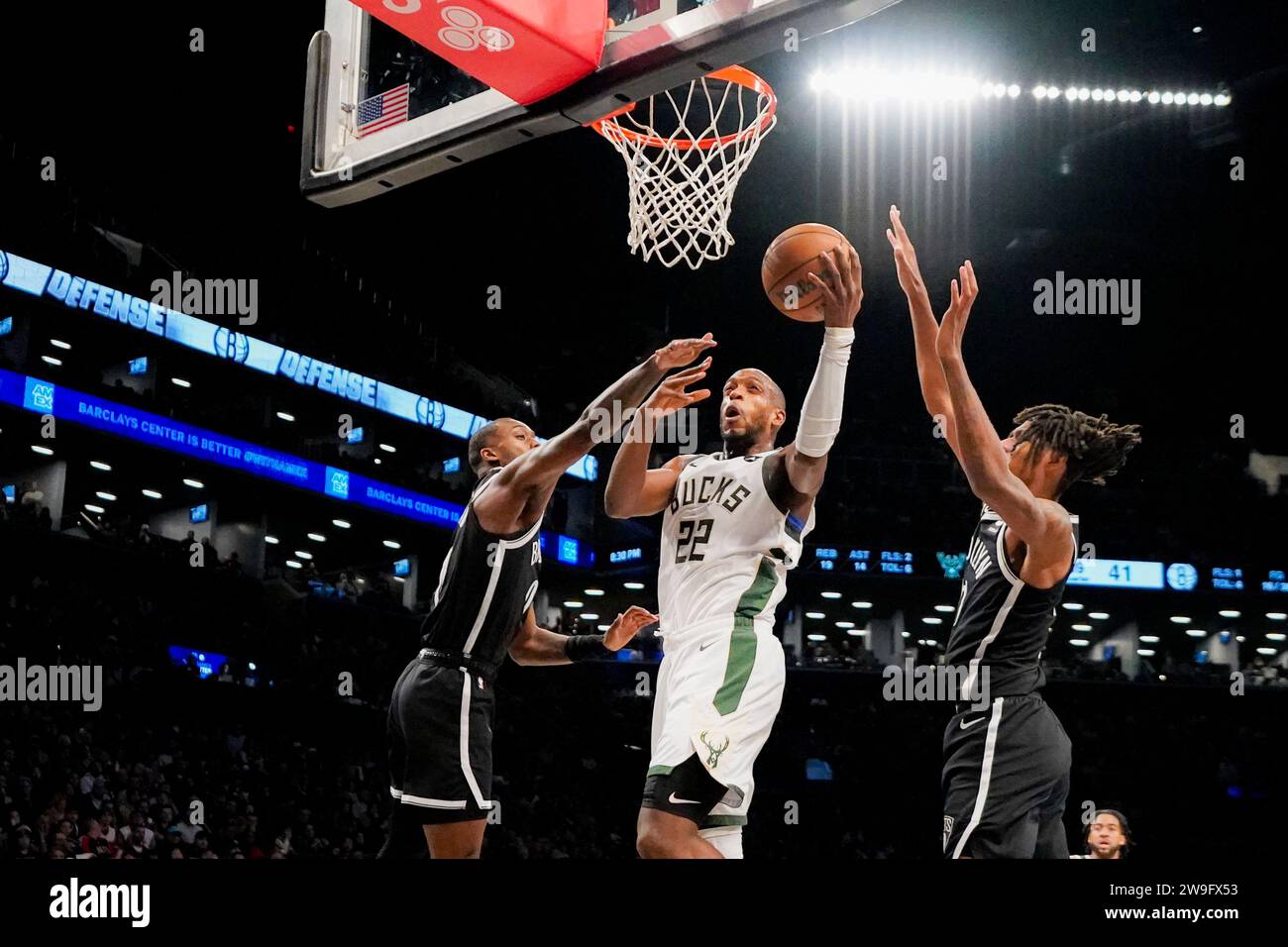 Milwaukee Bucks forward Khris Middleton (22) shoots against Brooklyn ...